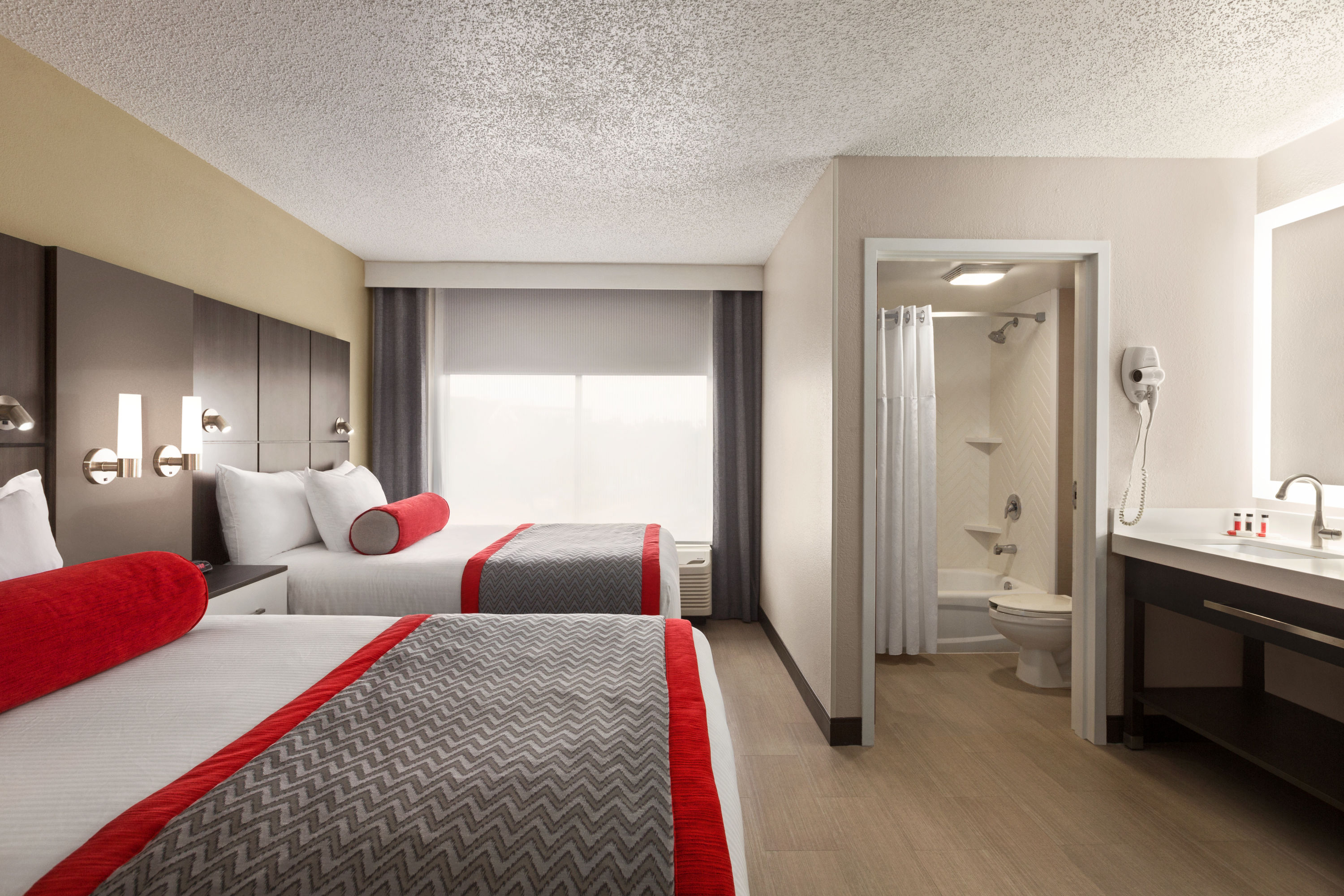 Ramada by Wyndham Suites Orlando Airport | Orlando, FL Hotels